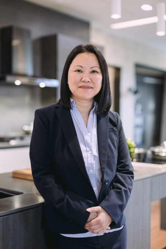 Ann Woo headshot | eSchool News